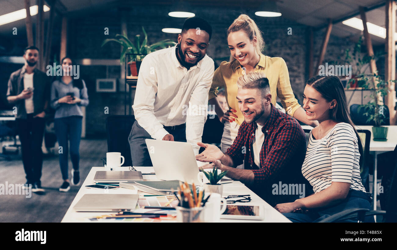 Collaborative process of multiracial designers at brainstorming meeting ...