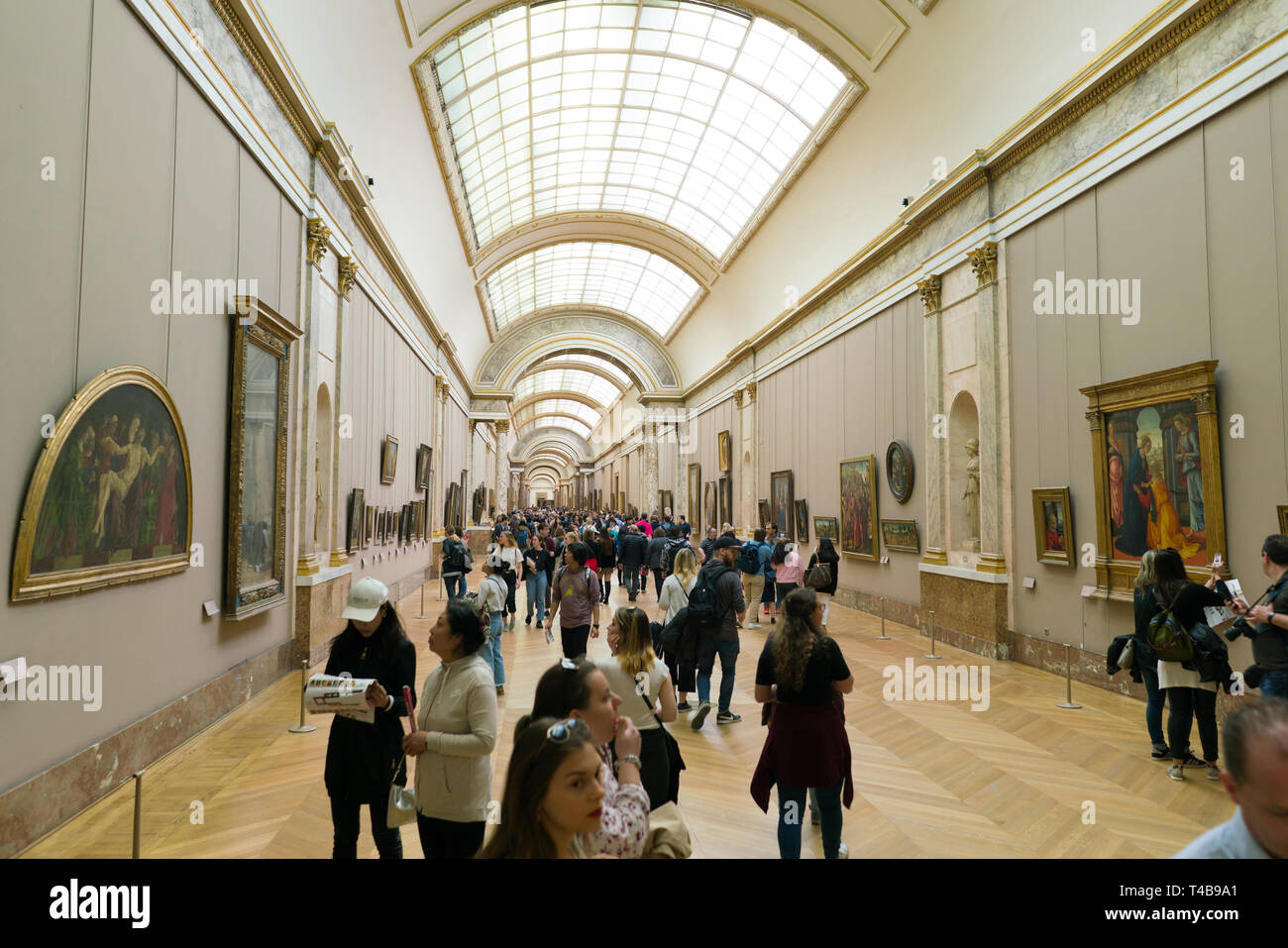 Paris, France - March 31, 2019: Visitors Walking the Louvre museum ...