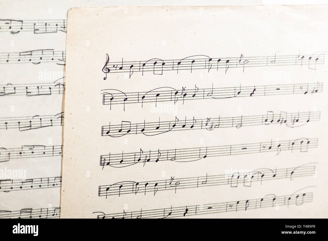 vintage paper sheet with handwritten musical notes Stock Photo - Alamy