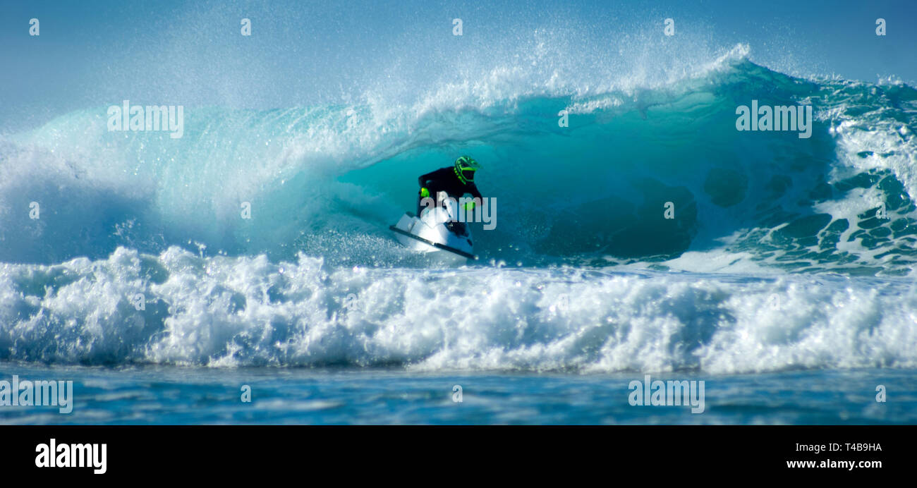 Jetski rider in a wave at Hole in the Wall, South Africa Stock Photo ...