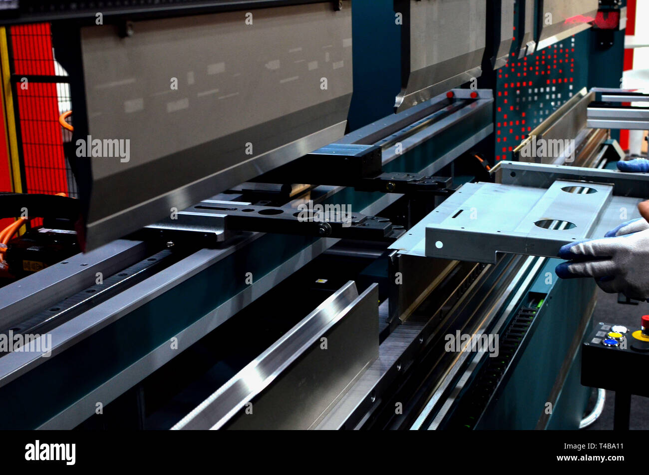 The process of bending sheet metal on a sheet bending machine Stock ...