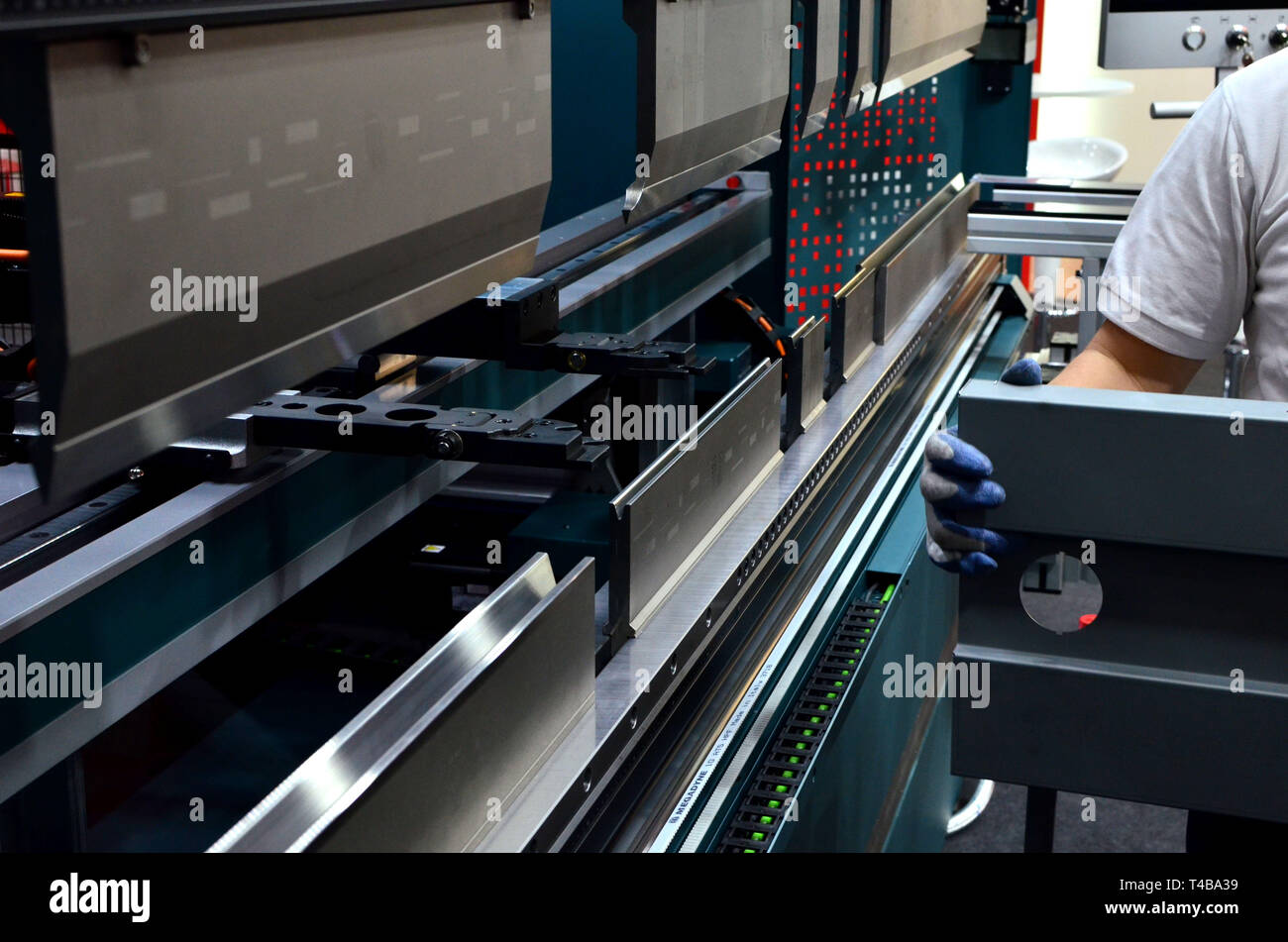 The process of bending sheet metal on a sheet bending machine Stock ...