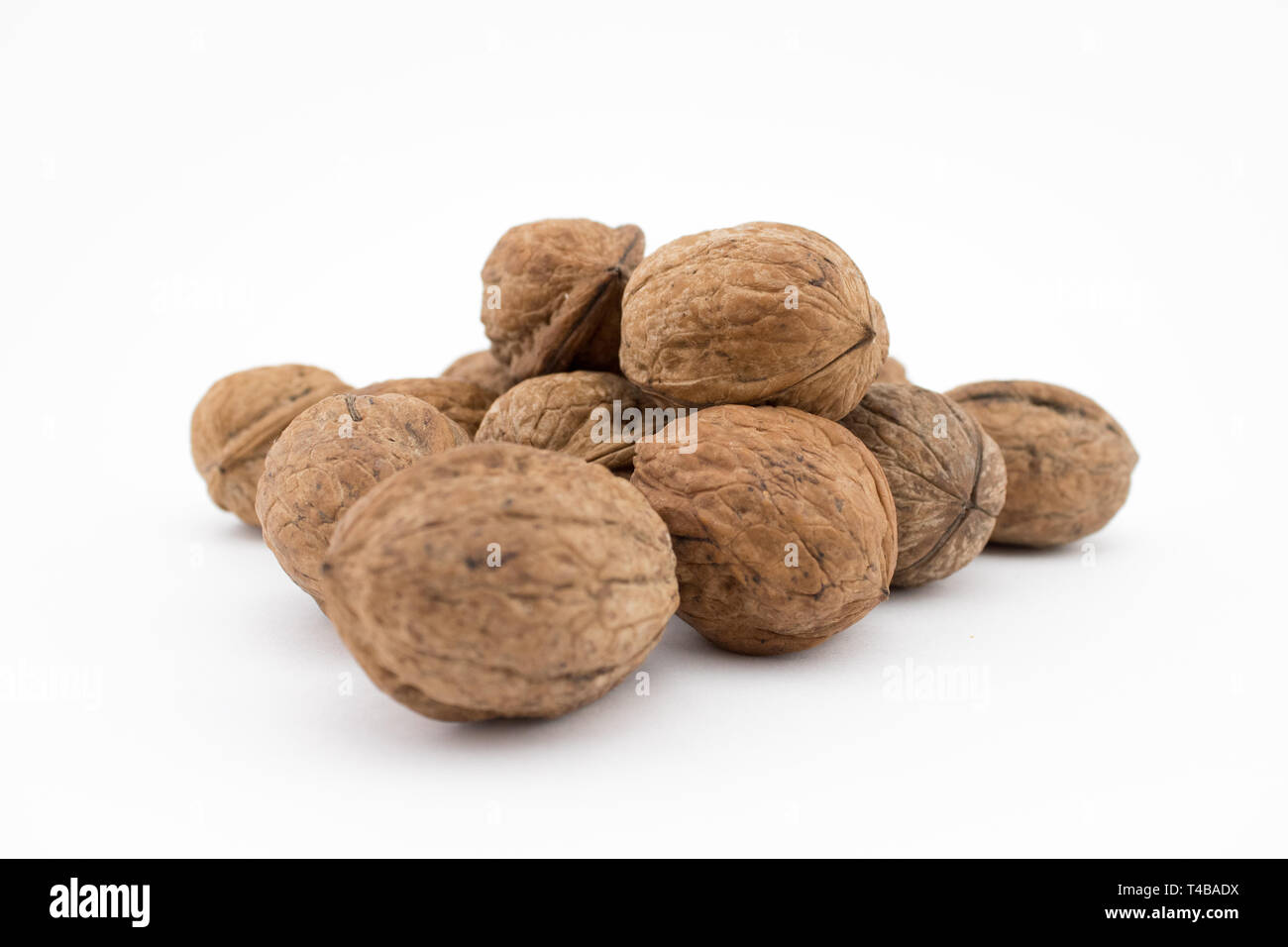 Walnuts on white background. The health benefits of walnuts are many ...