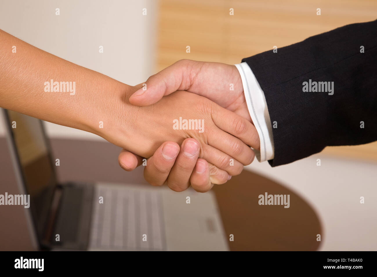 business teamwork and communication concept with handshake at the ...