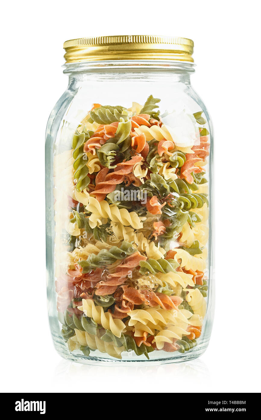 multi-colored pasta in a jar. isolated on white background. place for ...