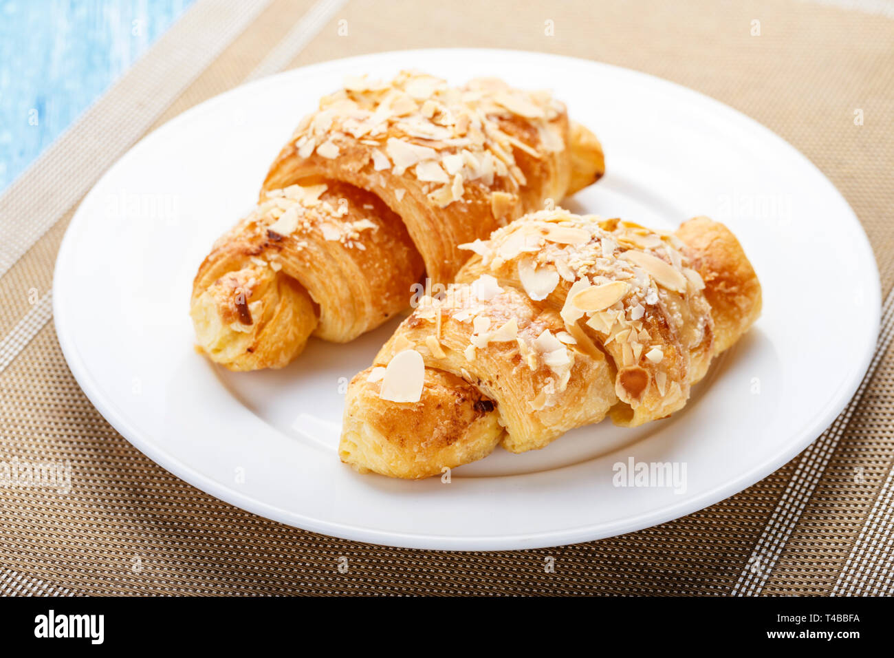 fresh french croissant in the plate. traditional nutritious breakfast ...