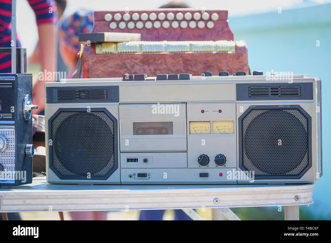 Old cassette recorder of silver color on table Stock Photo - Alamy
