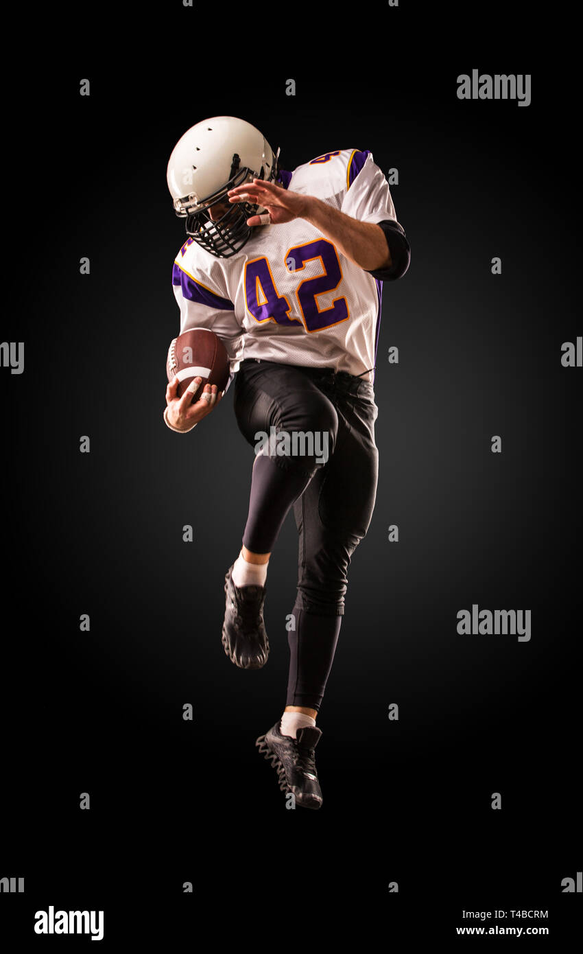 american football player in action. High jump of American football ...