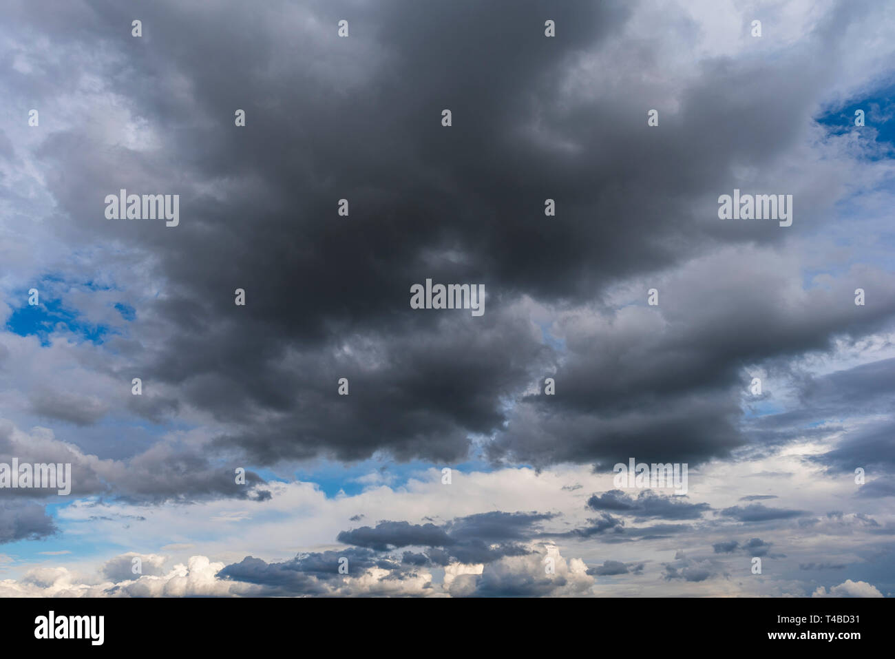 Dramatic rain storm clouds background Stock Photo - Alamy