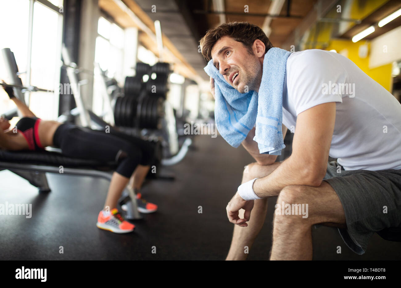 Handsome sporty man resting, having break after doing exercise Stock ...