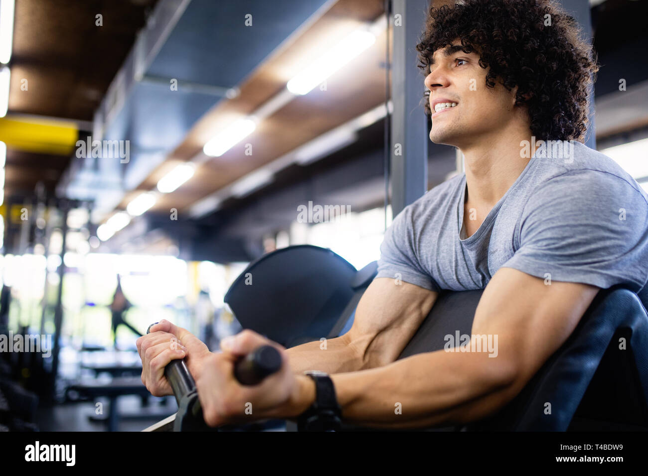 Handsome men exercising in gym hi-res stock photography and images - Alamy