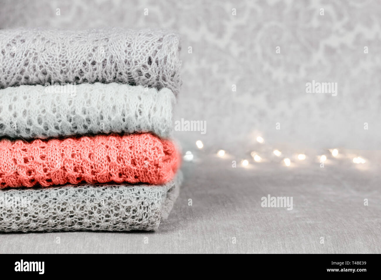 Stylish knitted pastel colored sweaters and one in color of the year ...