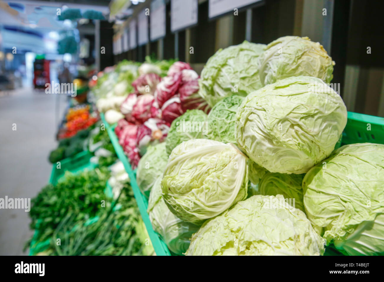 Unpacked, fresh vegetables in a self-service supermarket. Zero-waste ...