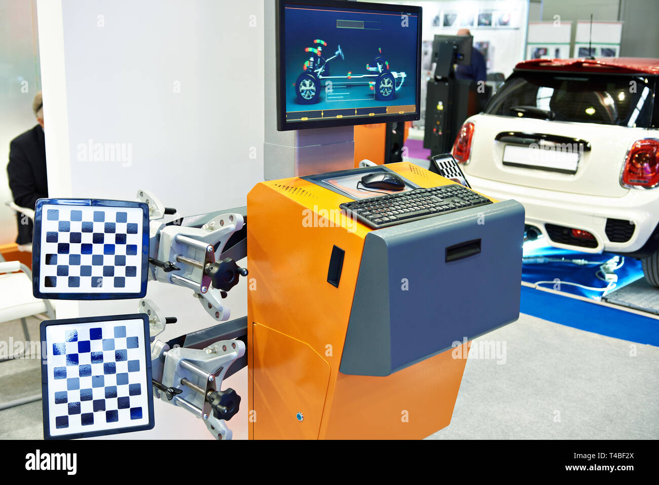 Wheel alignment stand with infrared communication Stock Photo - Alamy