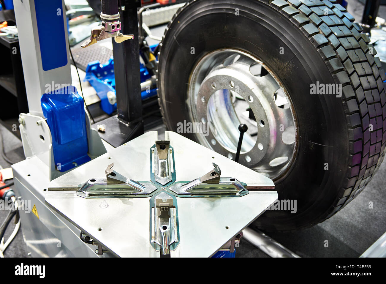 Conventional automatic tire changer in car truck service Stock Photo ...