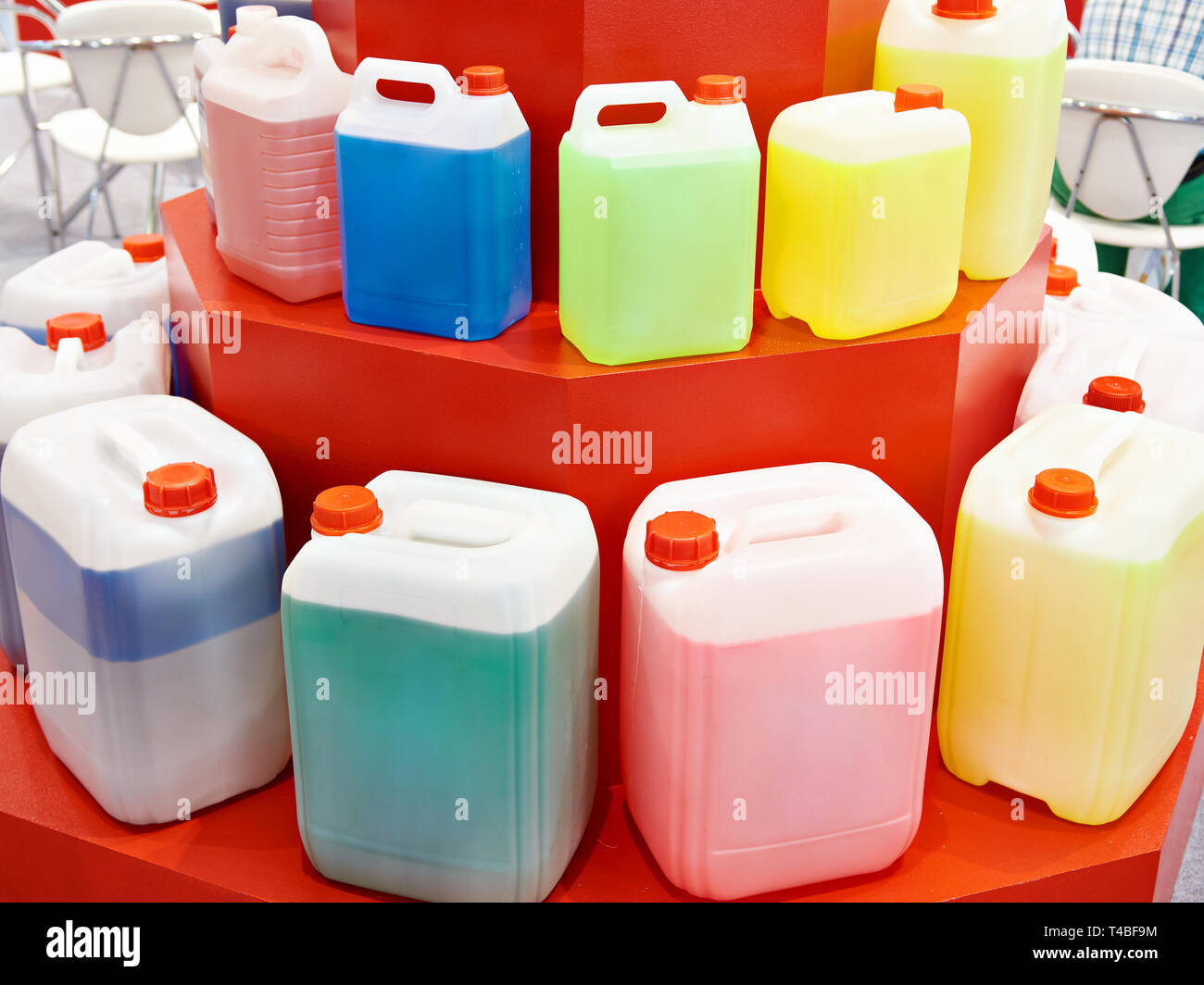 Plastic cans with colored liquids Stock Photo - Alamy