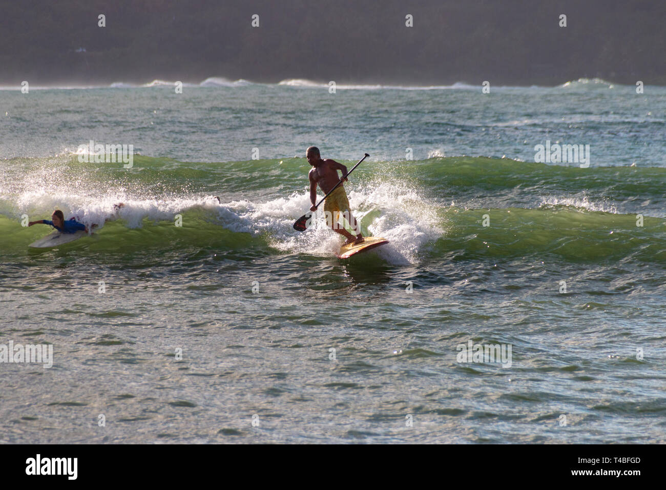 Hanalei, HI, USA - November 3, 2016: Surfer enjoying waves at Waioli ...