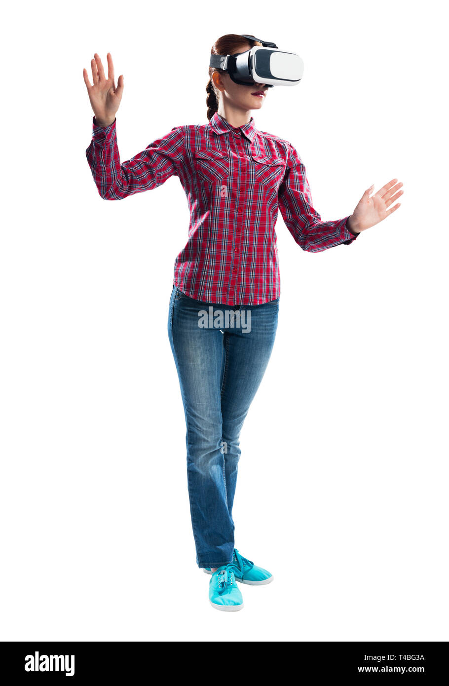 Young woman wearing VR goggles and gesturing in virtual reality. Woman ...