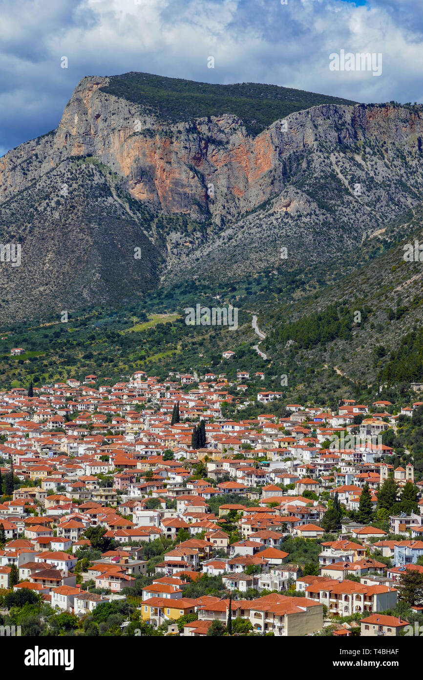 The small agricultural town of Leonidio surrounded by stark cliffs, the ...
