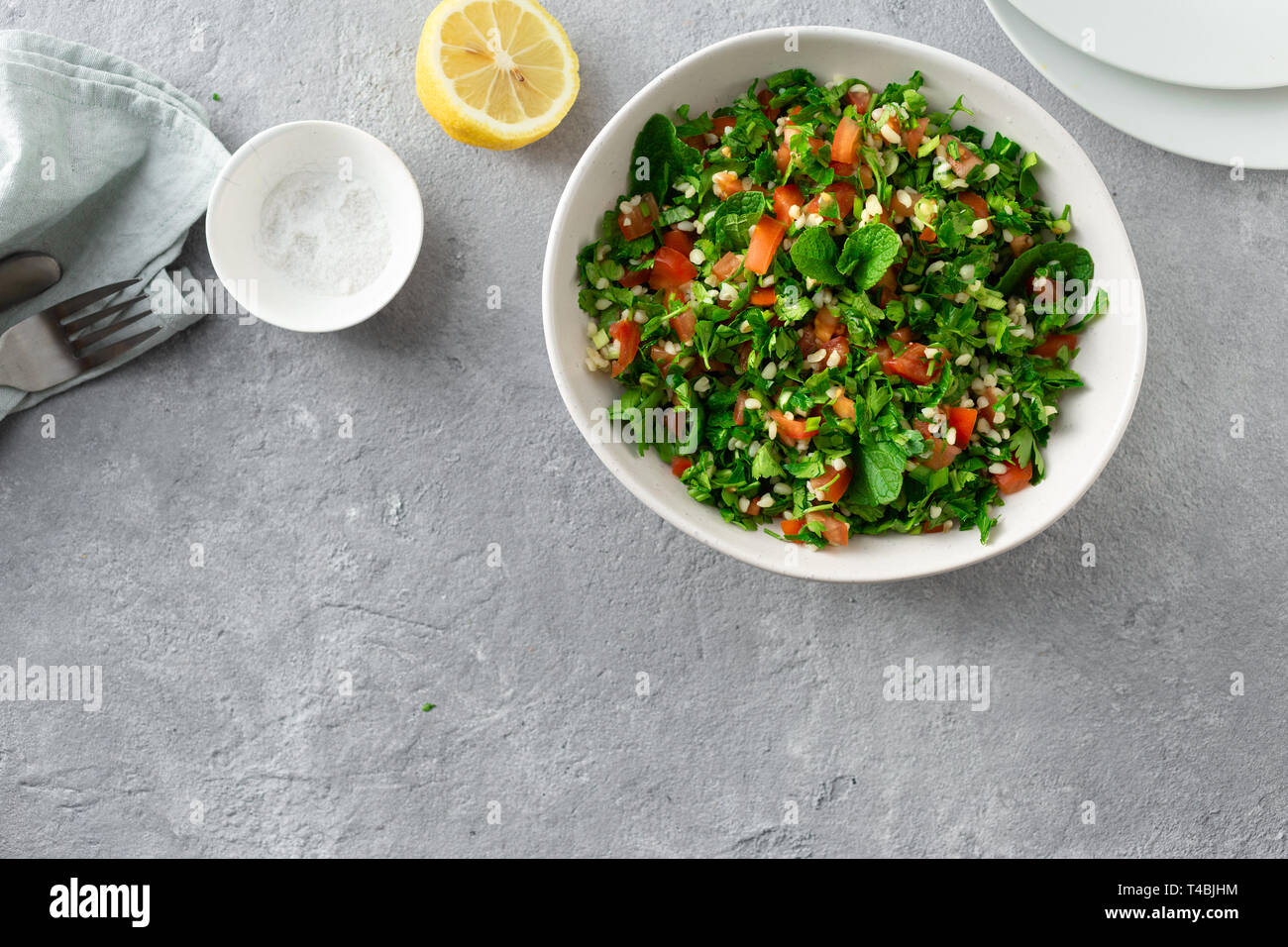 Bowl of summer salad tabouli top view Stock Photo - Alamy