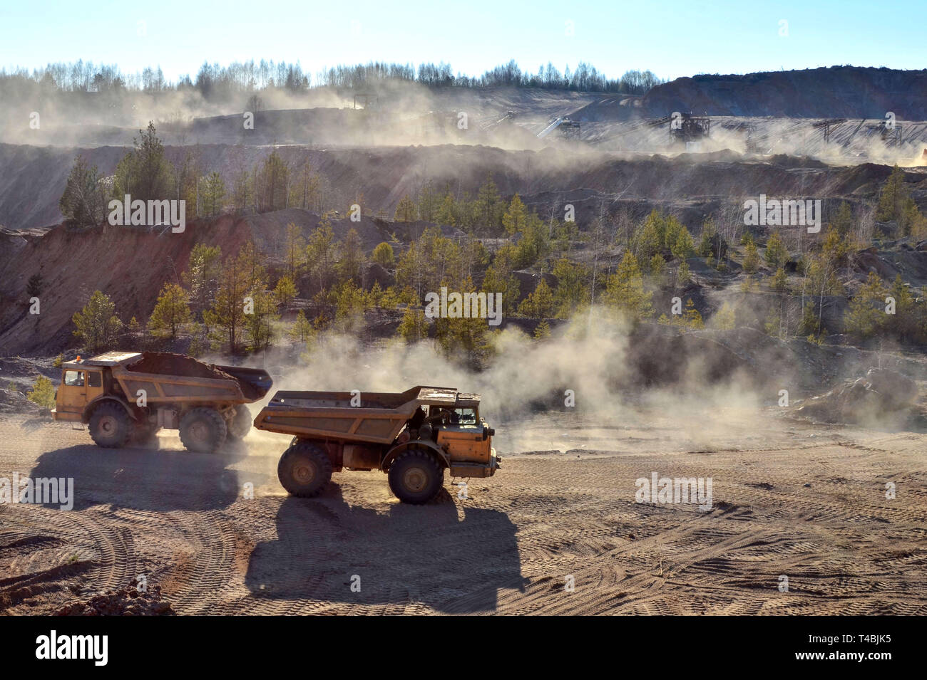 The work of heavy machinery and mining trucks for the transport of bulk ...