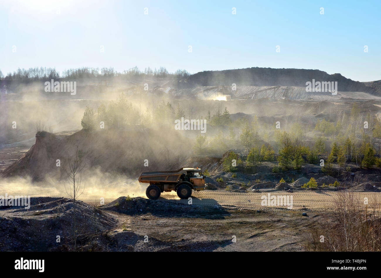 The work of heavy machinery and mining trucks for the transport of bulk ...