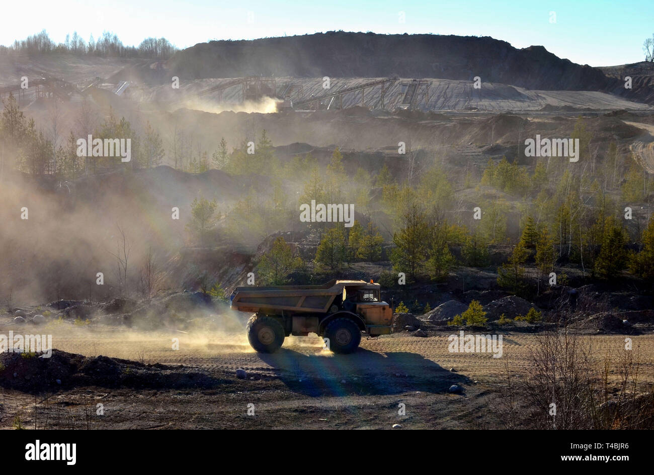 The work of heavy machinery and mining trucks for the transport of bulk ...