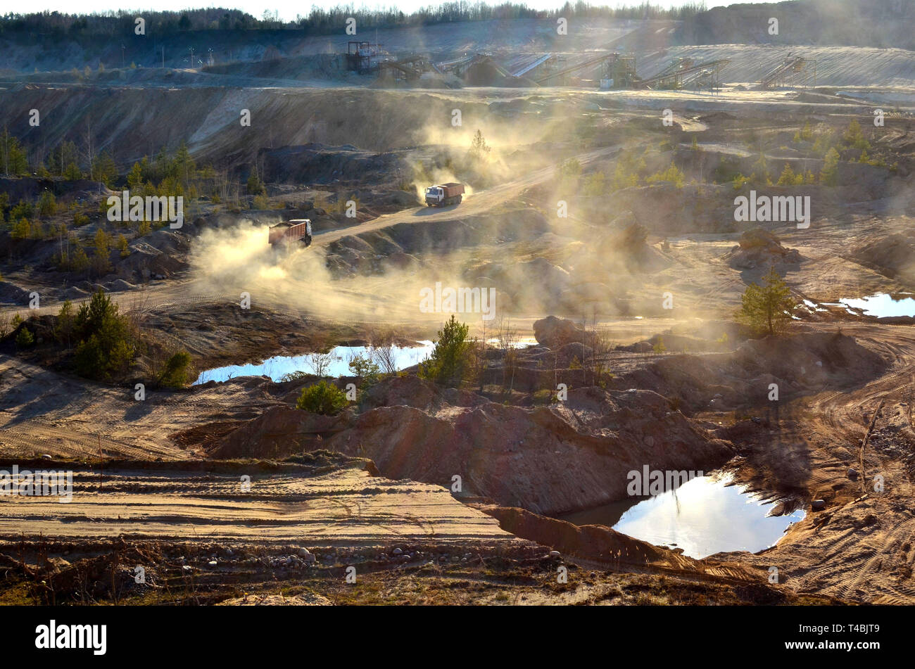 Mining dump truck transports sand and other minerals in the quarry ...