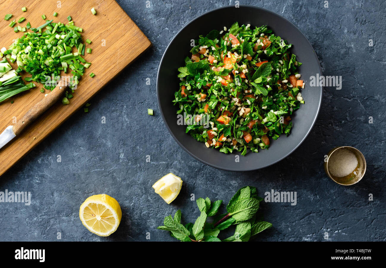 Bowl of summer salad tabouli top view Stock Photo - Alamy