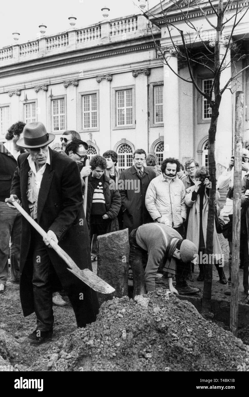 ProfessorJoseph Beuys starts to plant trees on the occasion of ...