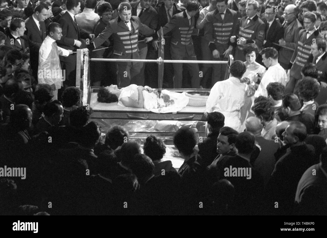 The illusionist Richiardi cuts up his assistant with a circular saw in ...