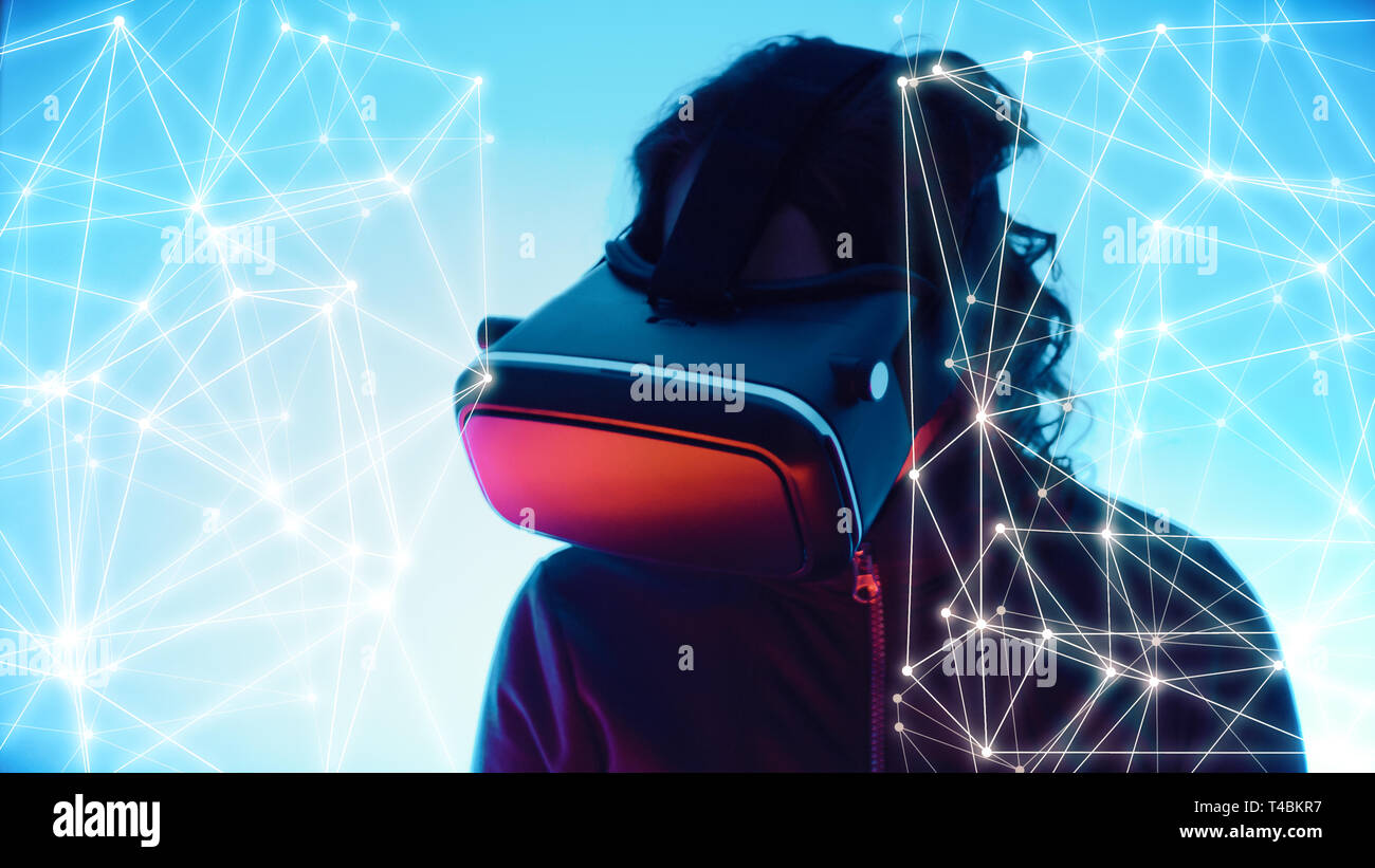 Woman using wearable vr technology headset, digital cyber virtual world ...