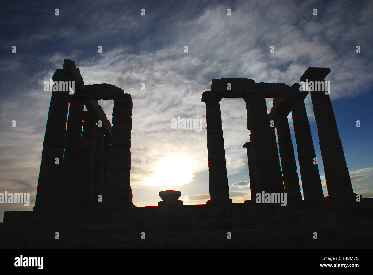 The bright sunset light on the alter at the Greek Temple of Poseidon ...