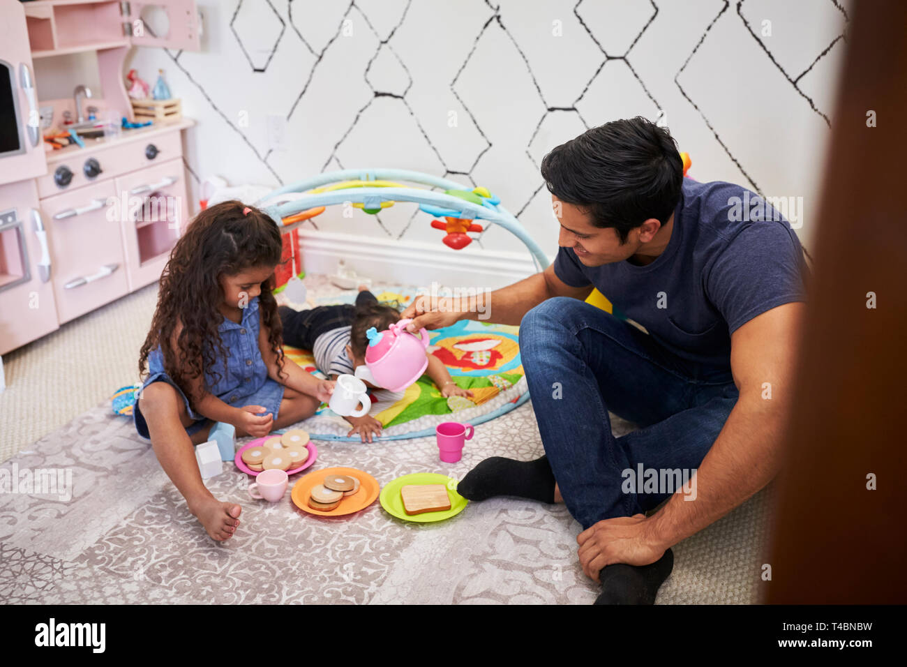 Children playing tea party hi-res stock photography and images - Alamy