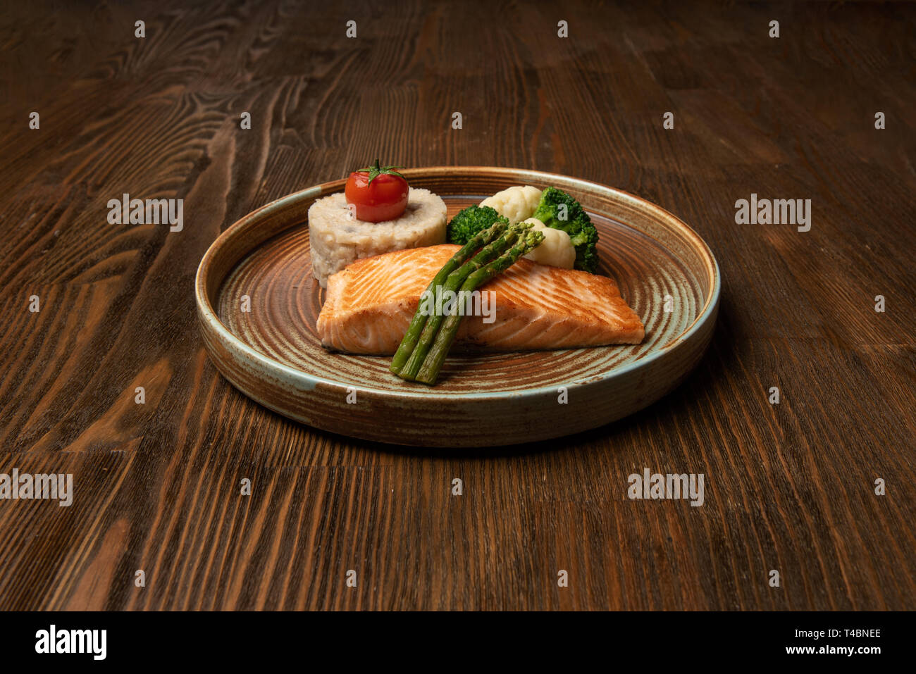 Salmon baked broccoli rice hi-res stock photography and images - Alamy