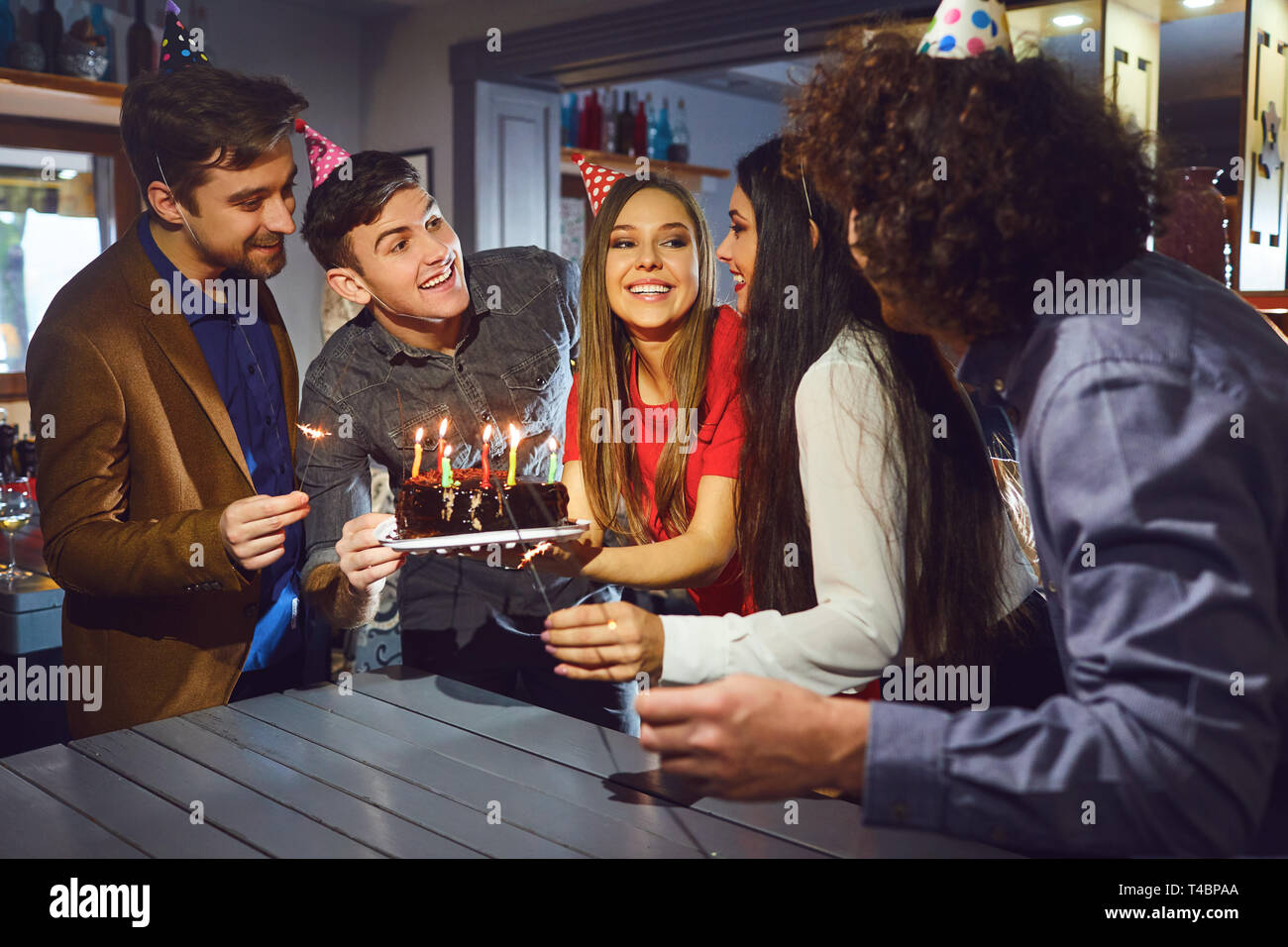 Friends celebrating birthday party hi-res stock photography and images ...