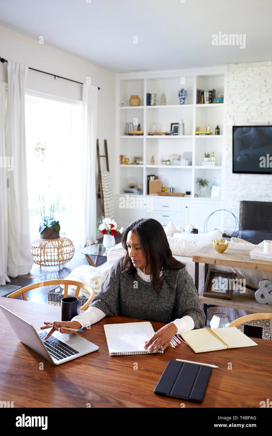 Sitting in the middle of a table hi-res stock photography and images ...