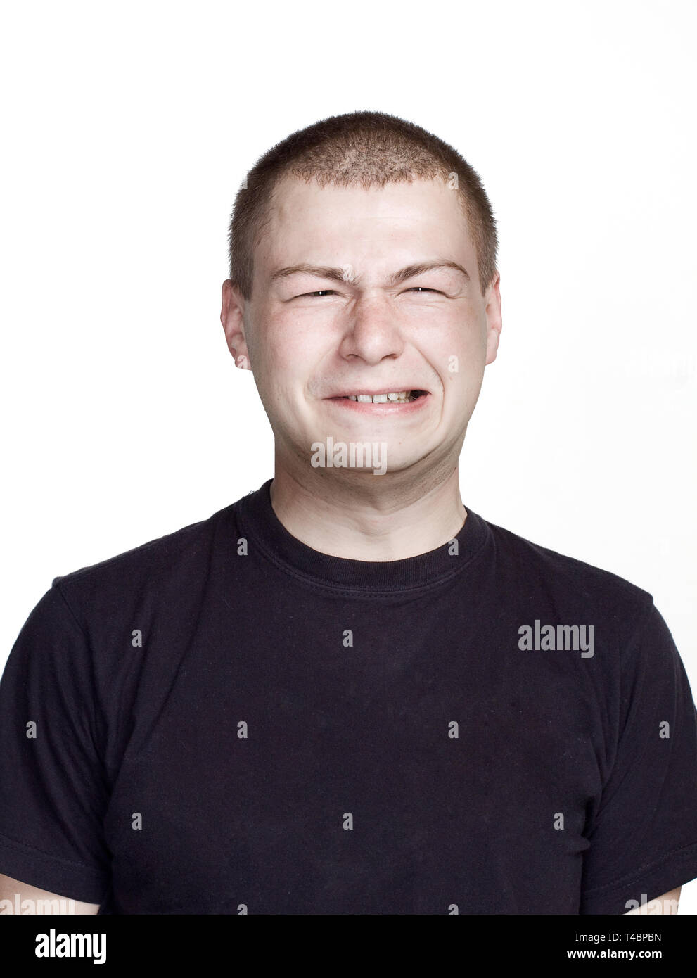 Funny face. Portrait of young man with Facial expression Stock Photo ...