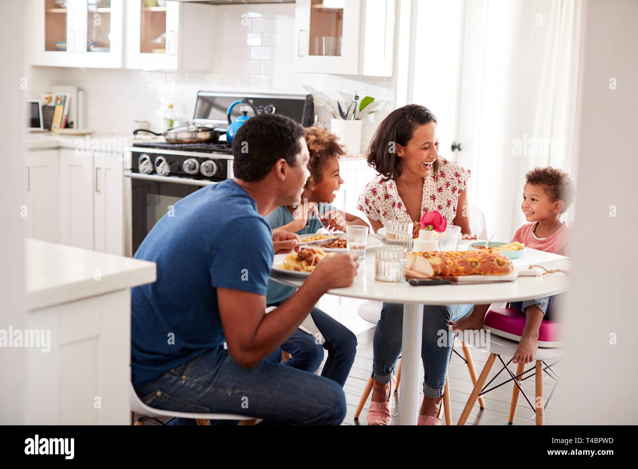 African american dad eating with kids hi-res stock photography and ...