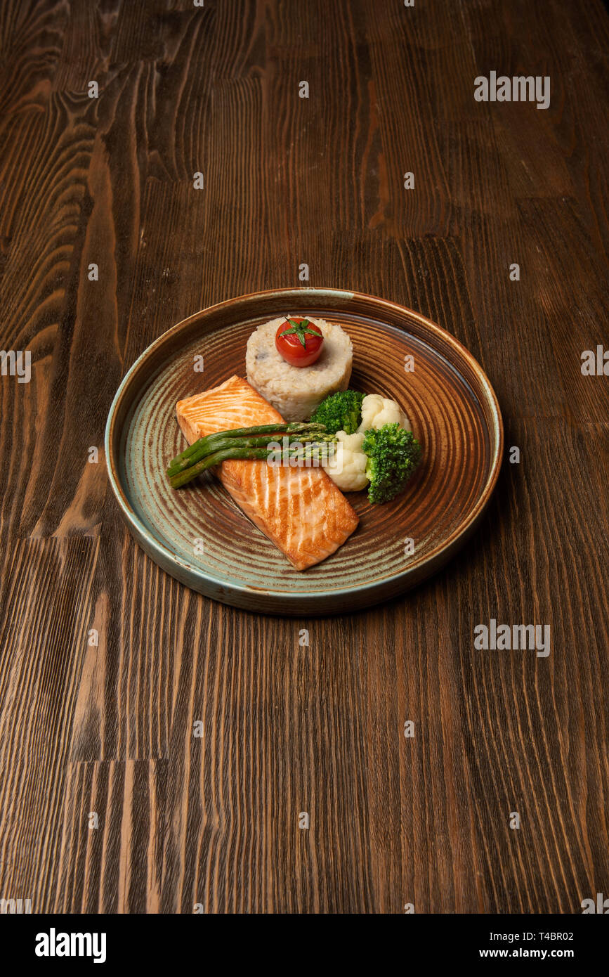 Salmon baked broccoli rice hi-res stock photography and images - Alamy