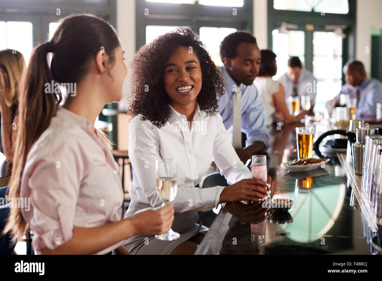 Women after work drinks bar hi-res stock photography and images - Alamy