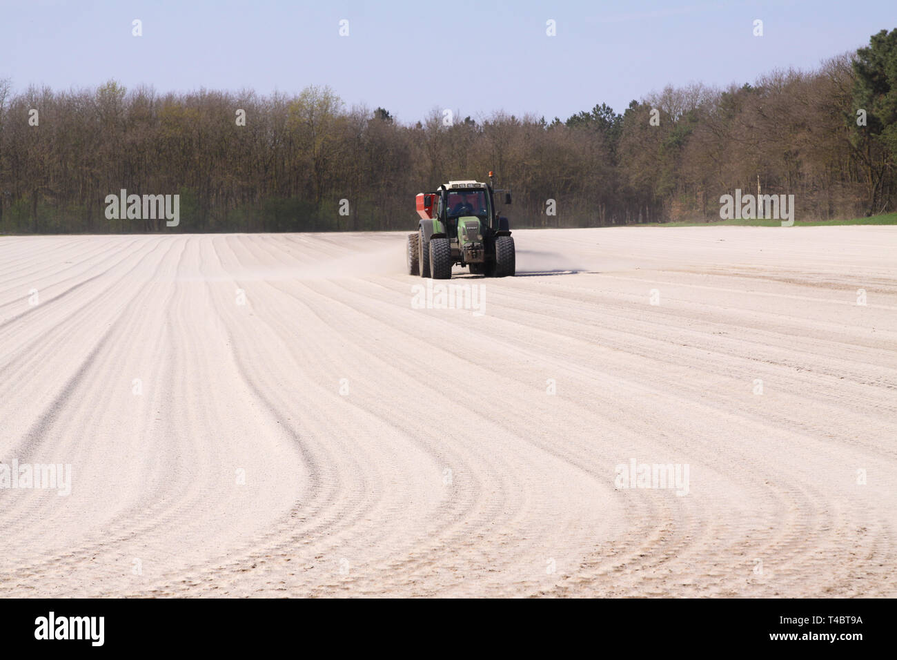 ROERMOND, NETHERLANDS - MARCH 30. 2019: Chalk fertilizer application by ...