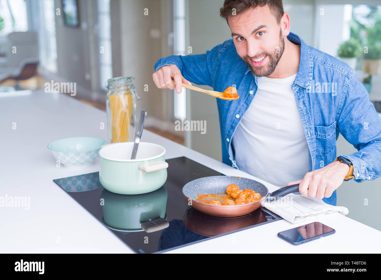 Man pasta meat vegetables hi-res stock photography and images - Alamy