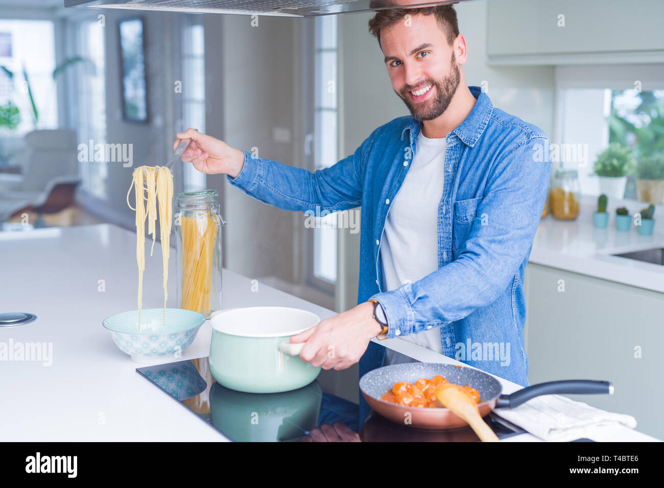 Hispanic boy eating pasta hi-res stock photography and images - Alamy