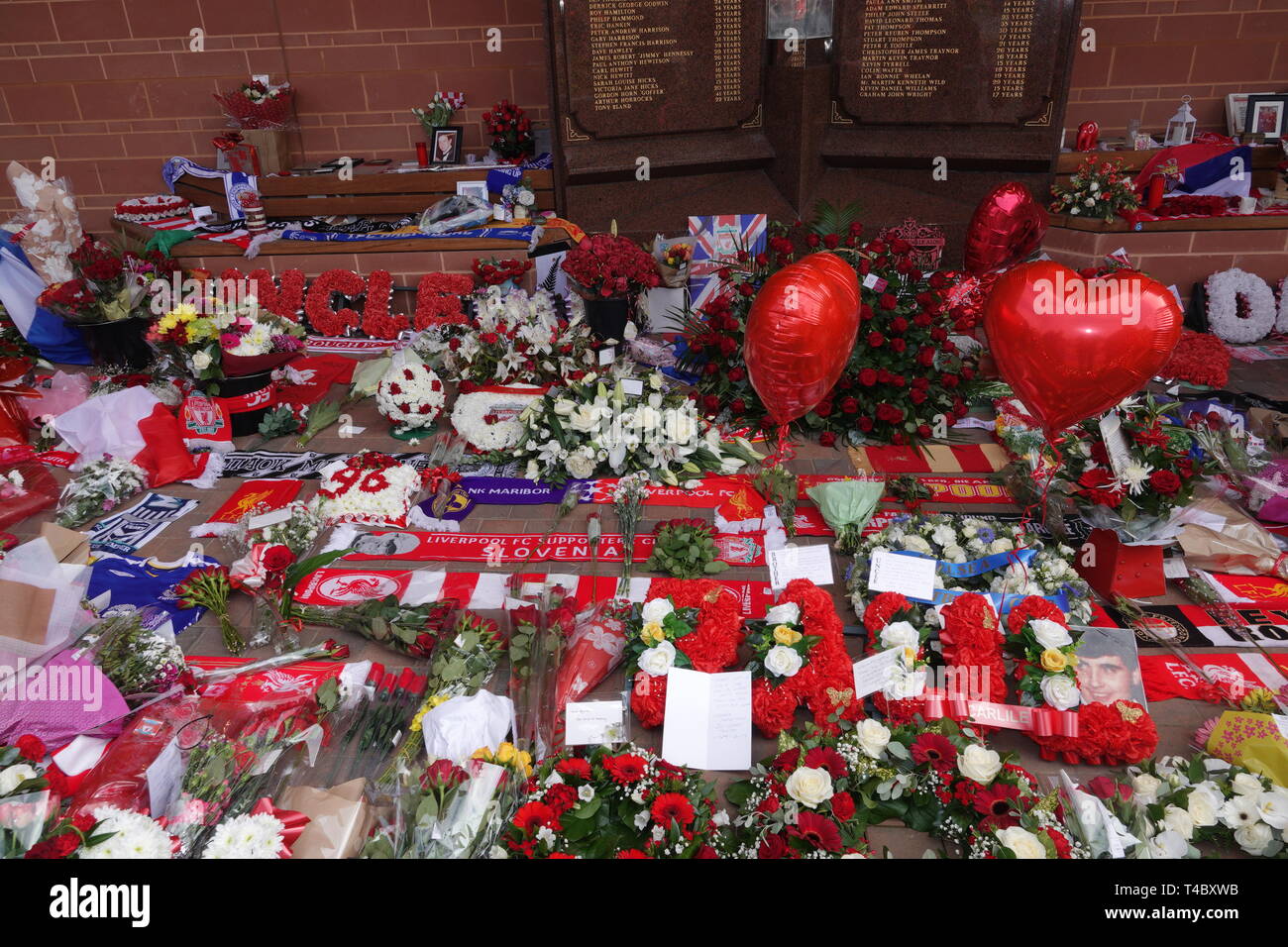 Liverpool UK, 15th April 2019. People gather at the Hillsborough ...