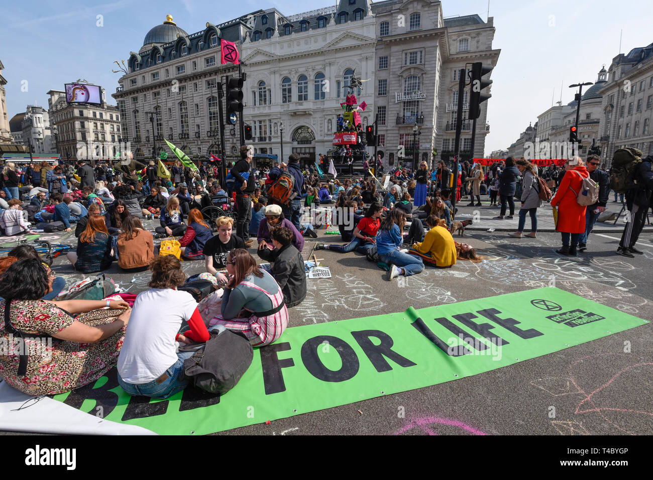 London, UK. 15 April 2019. People occupy Piccadilly Circus during ...