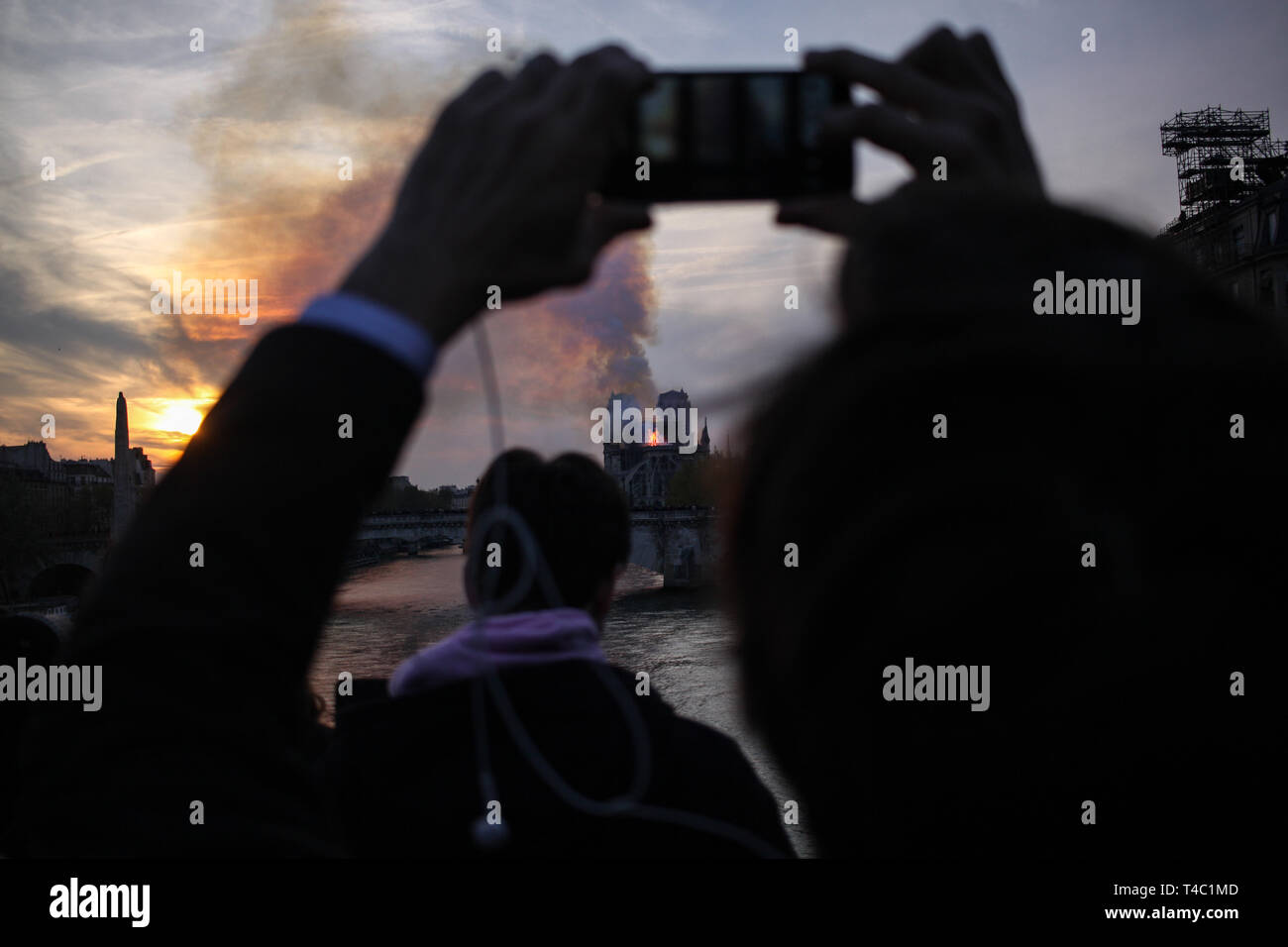 Paris, France. 15th Apr, 2019. Numerous people visit the Burning ...