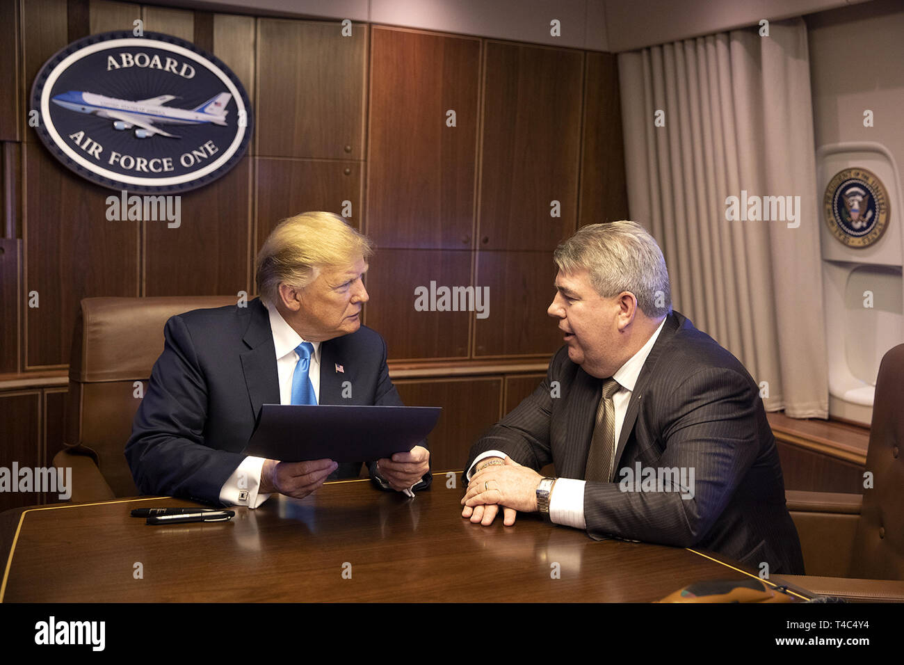 President Donald J. Trump is presented with the Pledge to America's ...