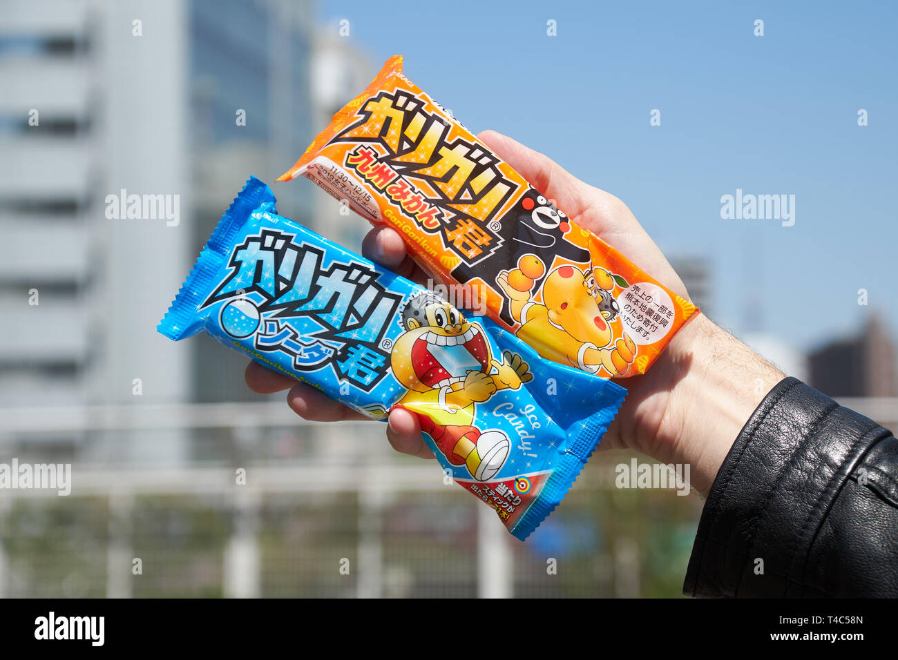 A man holds Garigari Kun popsicles in Tokyo on April 16, 2019. Almost ...