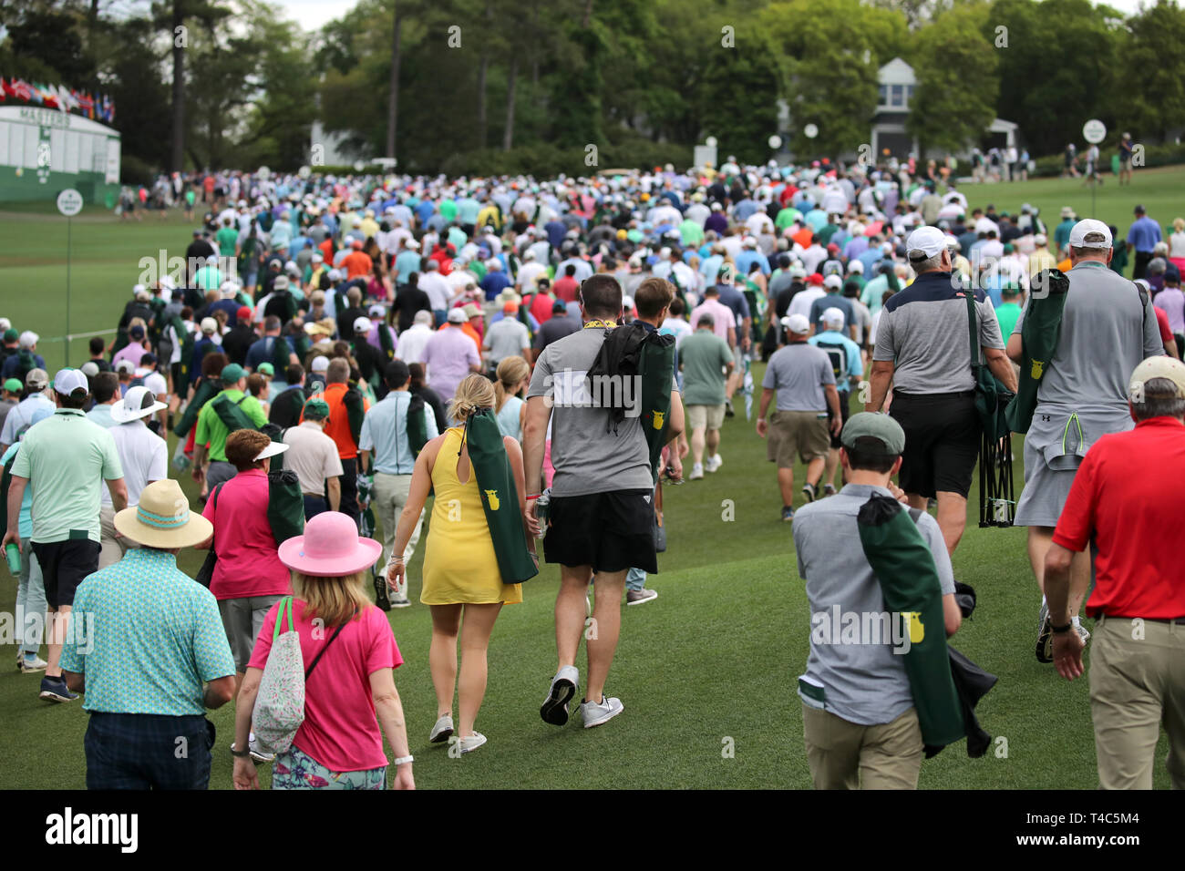 Fans react under a weather warning during the second round of the 2019 ...